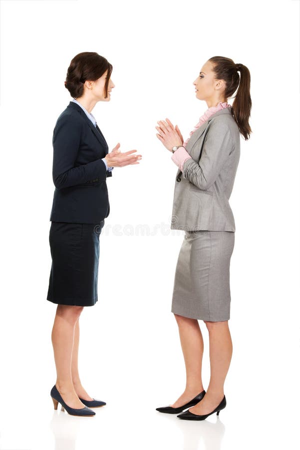 Two angry businesswomans. stock photo. Image of argue - 61327400