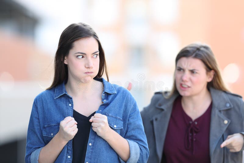 Angry Friends Having a Serious Conversation Outdoors Stock Photo ...