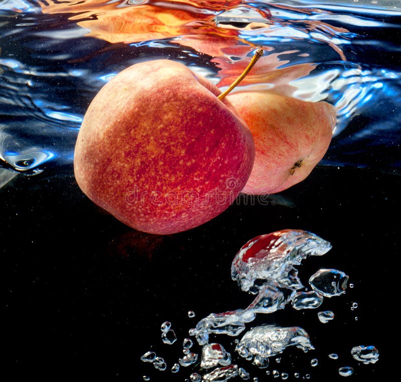 Two apple in water stock image. Image of black, natural - 85256591