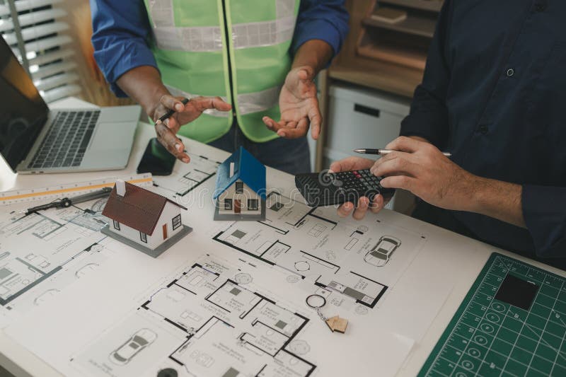 Two Architect is in Office and Sharing Their Strategy Idea of Building ...