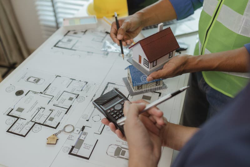 Two Architect is in Office and Sharing Their Strategy Idea of Building ...