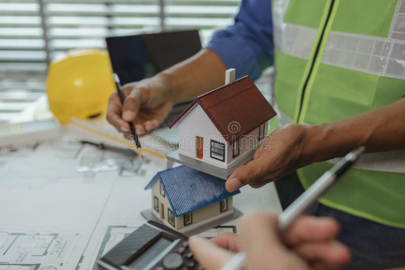 Two Architect is in Office and Sharing Their Strategy Idea of Building ...