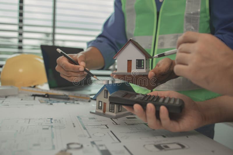 Two Architect is in Office and Sharing Their Strategy Idea of Building ...