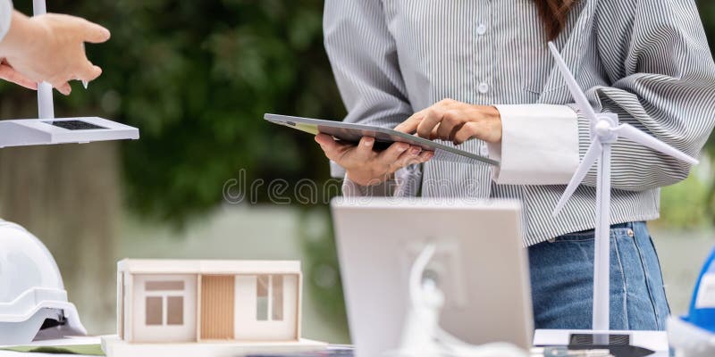 Sustainability and Green Architecture. Two Women Discussing Eco ...