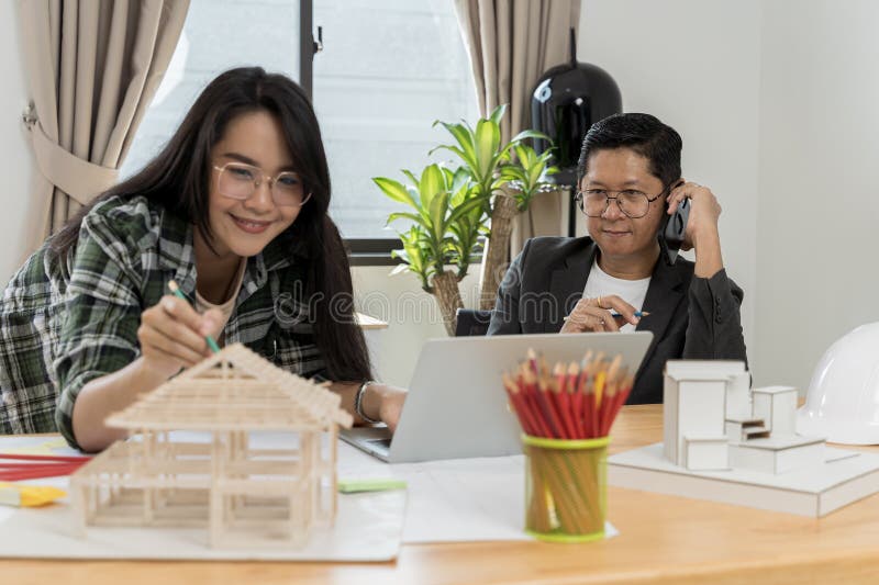 Two Architects Discussing New Project. Data Working and Tablet Laptop Stock Image - Image of ...