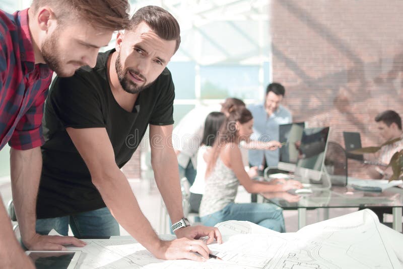 Two Architects Discussing a New Project Stock Image - Image of ...