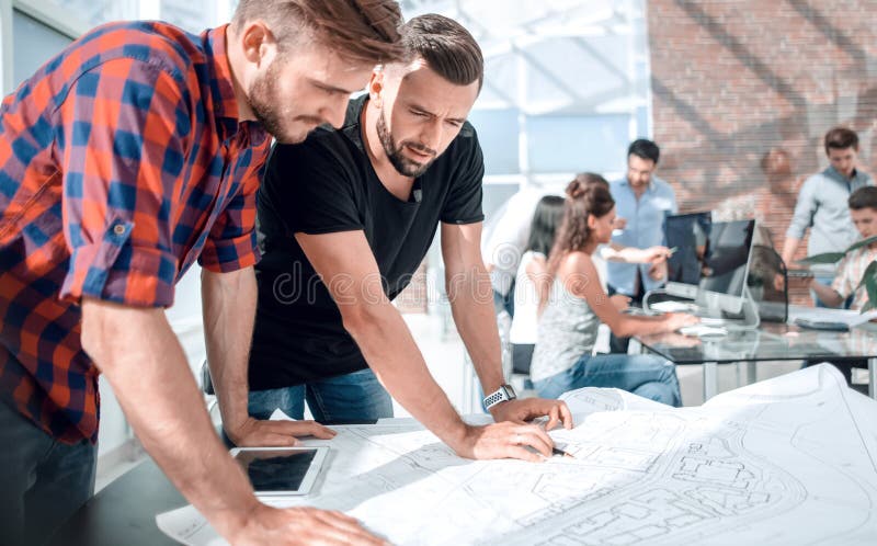 Two Architects Discussing a New Project Stock Image - Image of ...