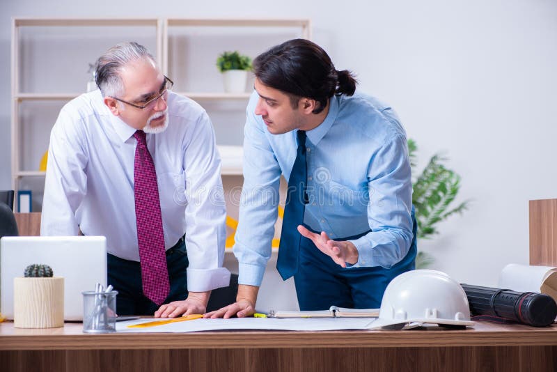 The Two Architects Working on the Project Stock Image - Image of ...