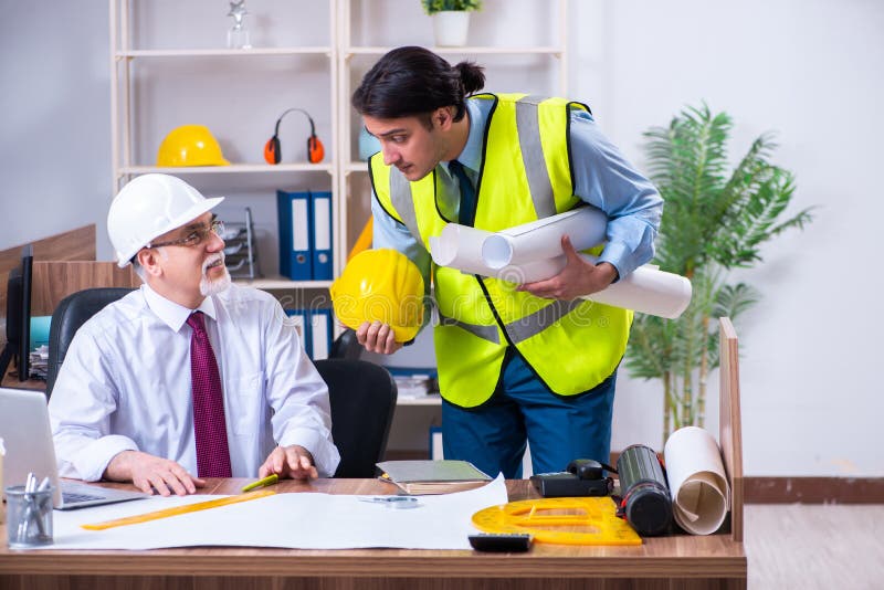 The Two Architects Working on the Project Stock Image - Image of ...