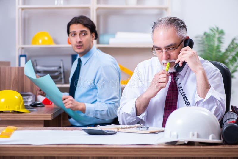 Two Architects Working on the Project Stock Photo - Image of builder ...