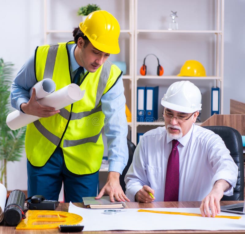 Two Architects Working on the Project Stock Image - Image of blueprint ...