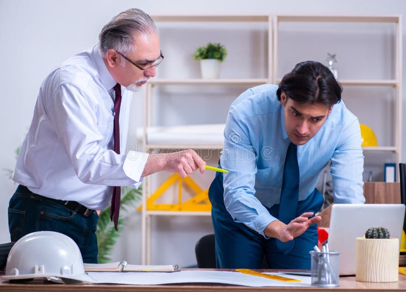 Two Architects Working on the Project Stock Image - Image of engineer ...