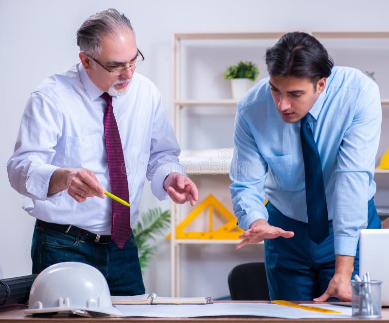 Two Architects Working on the Project Stock Image - Image of building ...