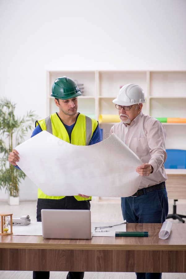Two Male Architects Working on the Project Stock Image - Image of ...