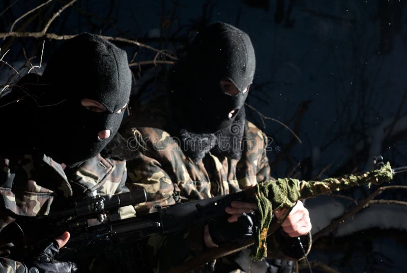Two armed military men. stock image. Image of commando - 18495987