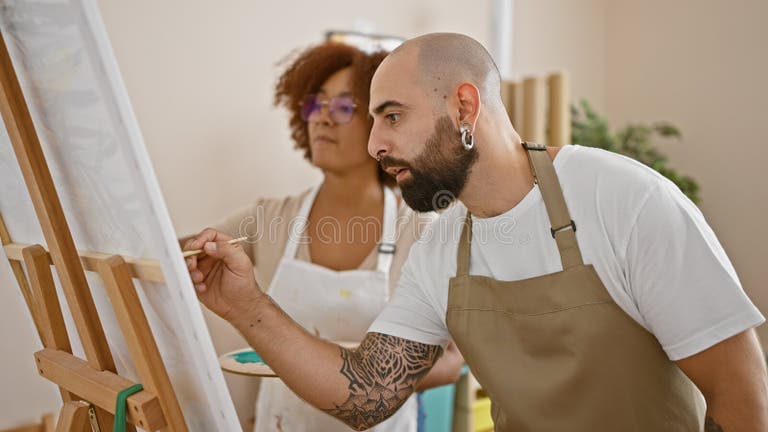 Two Artists Drawing Together Looking Upset at Art Studio Stock Photo ...