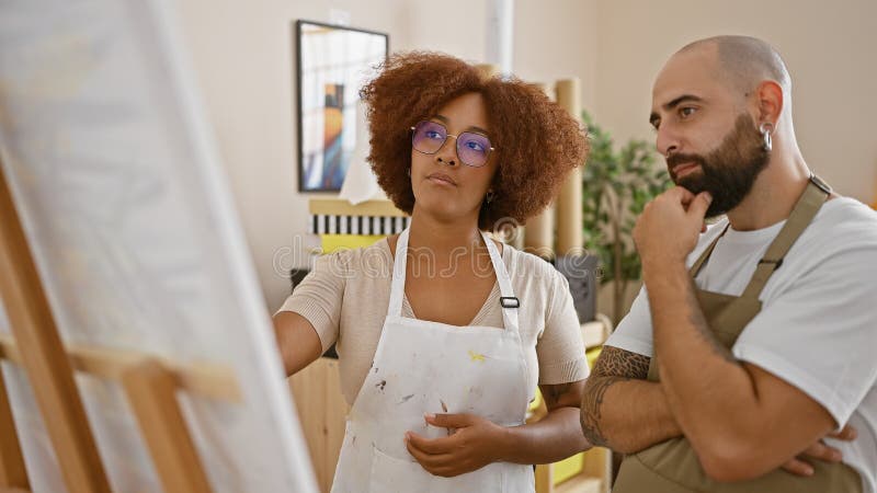 Two Artists, Partners in Creativity, Standing Together in the Studio ...