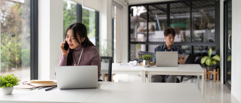 Two Asian Businesspeople Colleague Working at Modern Office Stock Image ...