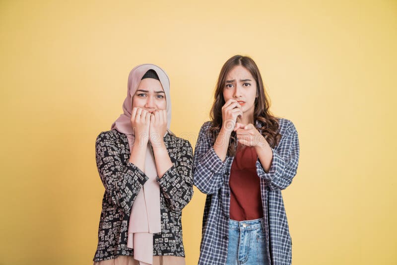 Two Asian Girls Looking at Scared Expression and Pointing Finger at ...