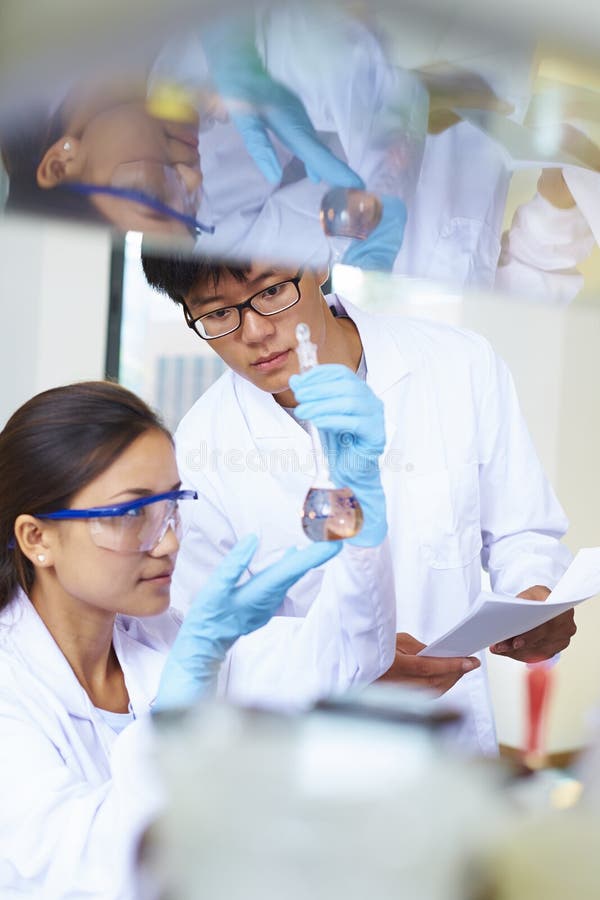 Two Asian Laboratory Scientist Working at Lab with Test Tubes Stock ...