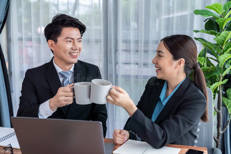 Two Asian Office Workers Taking Coffee Break Together in Workplace ...