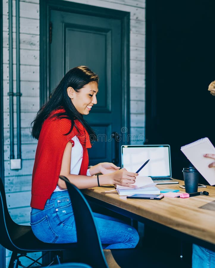 Two Asian Students Discussing Plan of Collaboration on Project Stock ...