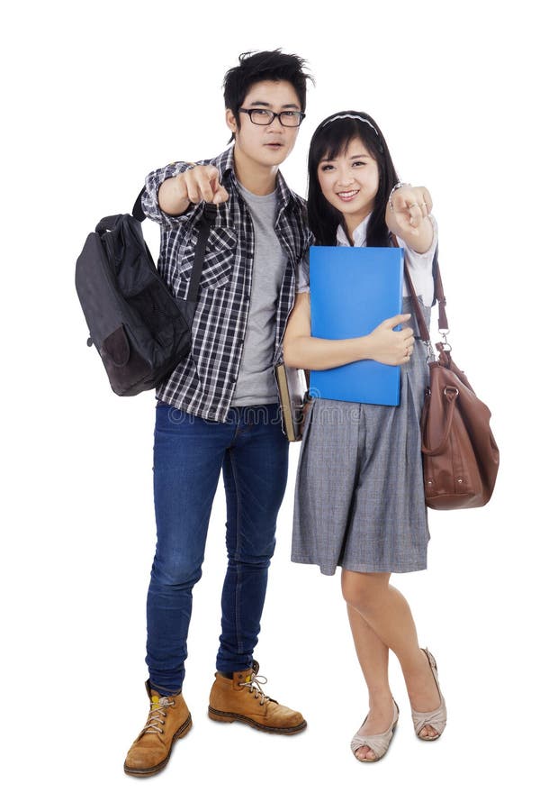 Two Asian Students Pointing at Camera Stock Image - Image of friendly ...