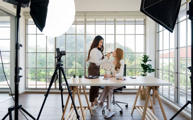 Two Asian Women Creating Content for Social Media. they are Using a ...