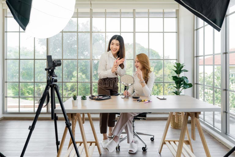 Two Asian Women Creating Content for Social Media. they are Using a ...
