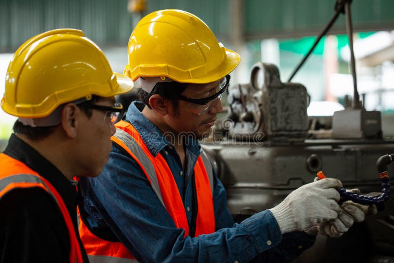 Two Asian Worker Check Status Task in Production Line Stock Photo ...