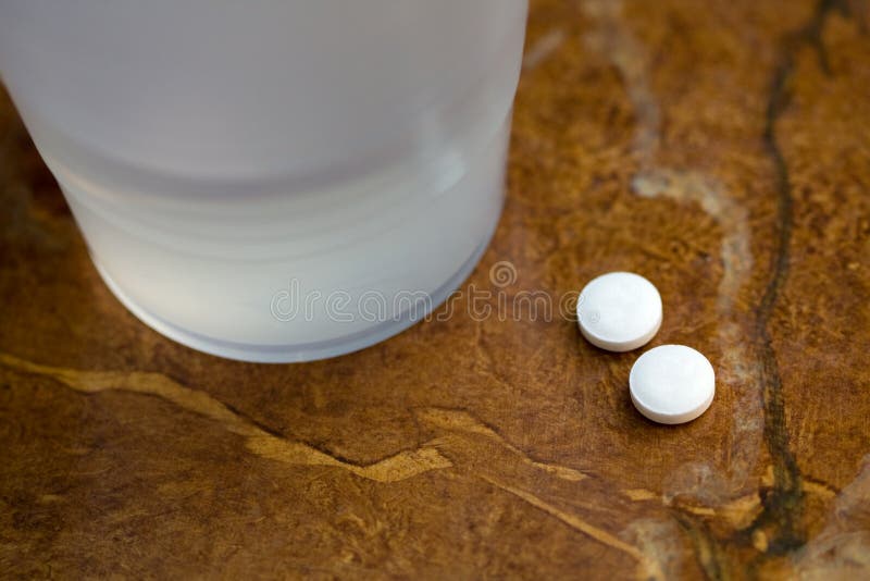 Two Aspirin stock photo. Image of pharmacology, glass - 16171236
