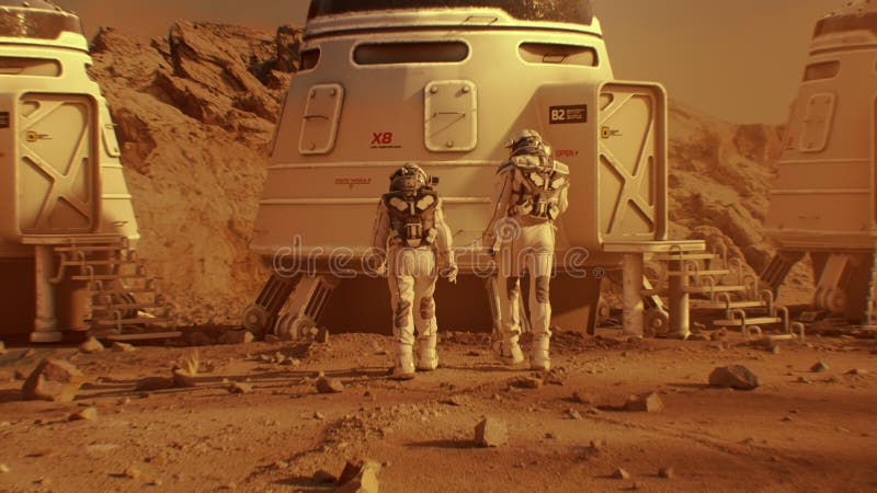 Two Astronauts in Spacesuits Walk Toward Base on Mars Stock Video ...