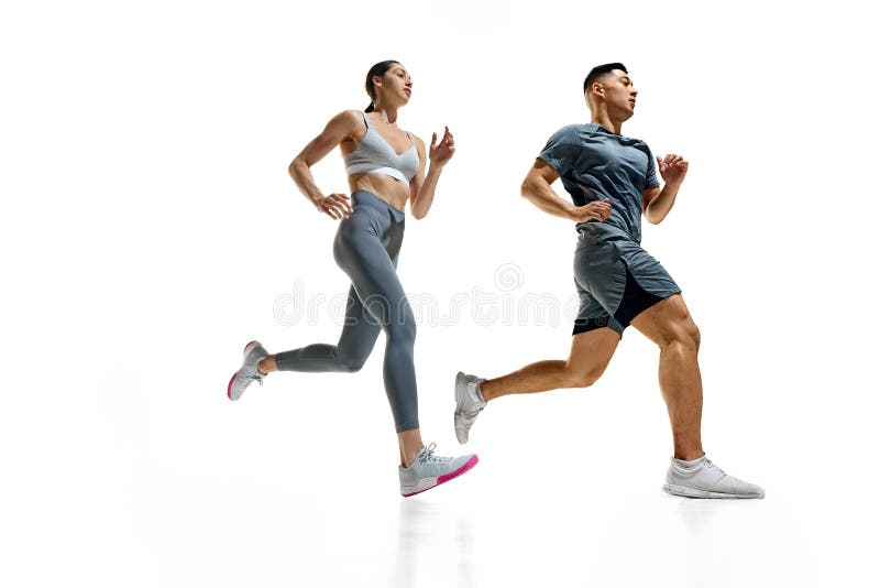 Two Athletes Sprinting, Captured in Moment of Peak Effort Against White ...