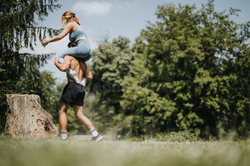 Two Athletic Friends Exercising Together Outdoors in a Park Stock Photo ...