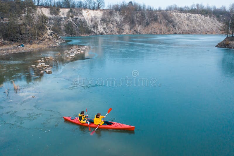 Two Athletic Man Floats on a Red Boat in River Editorial Photography ...