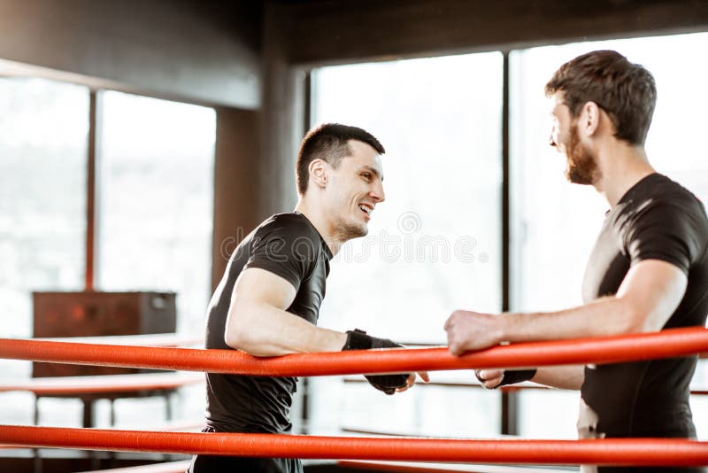 Men Having a Break on the Boxing Ring Stock Photo - Image of sunny ...
