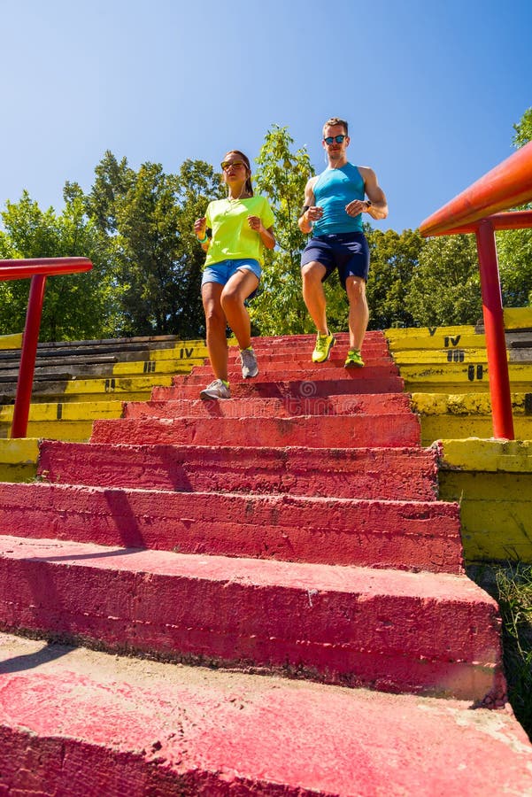 Runners Training Outdoors Working Out Stock Photo - Image of handsome ...