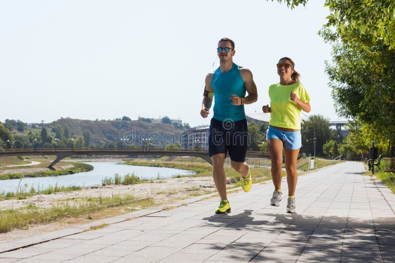 Runners Training Outdoors Working Out Stock Photo - Image of jogger ...