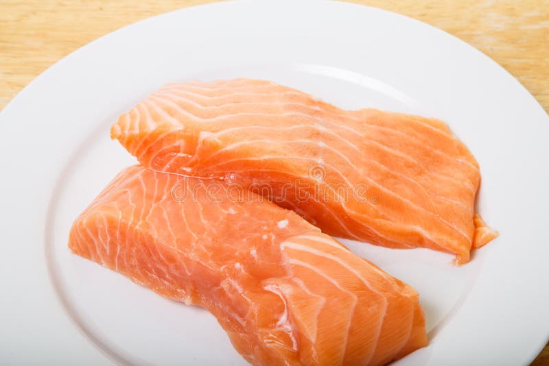 Two Atlantic Salmon Fillets on White Plate Stock Photo - Image of ...