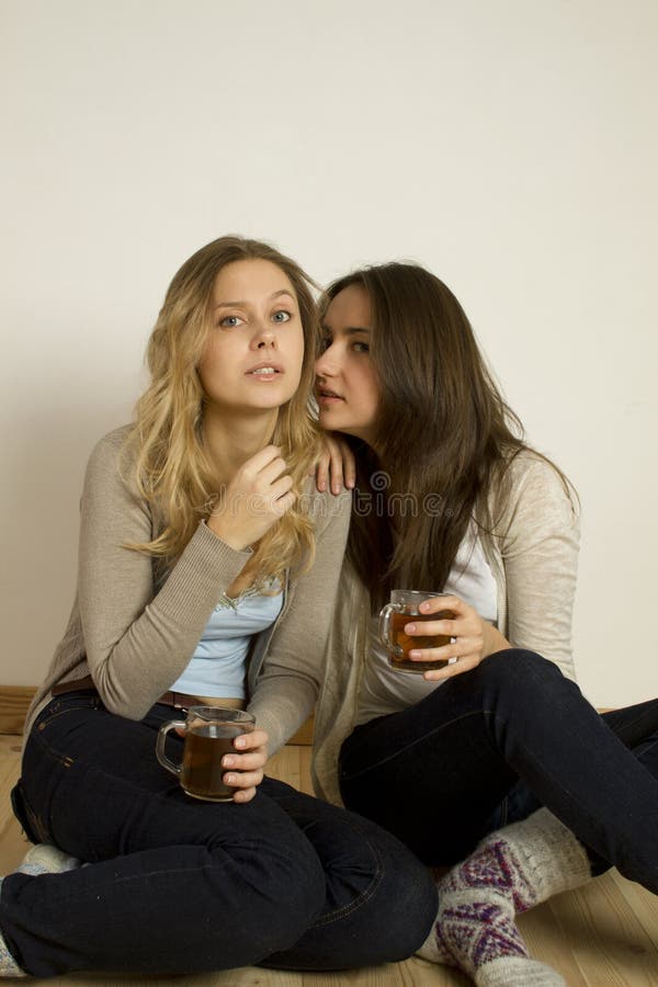 Two Attractive Friends Drinking Tea Stock Photo - Image of brunette ...