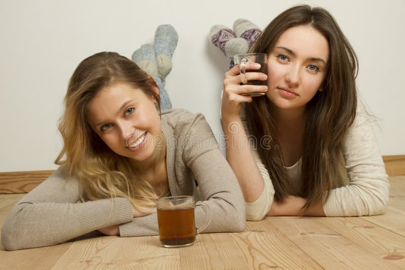 Two Attractive Friends Drinking Tea Stock Image - Image of relax ...