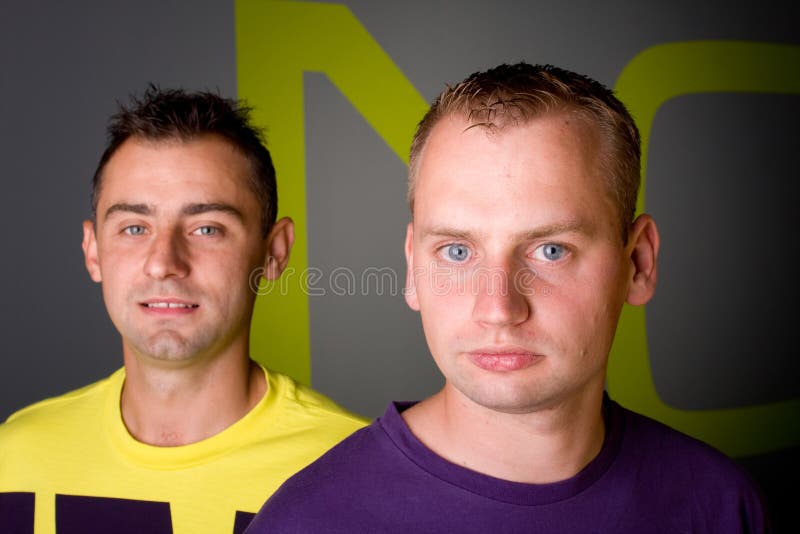 Two attractive guy stock photo. Image of purple, caucasian - 23164146