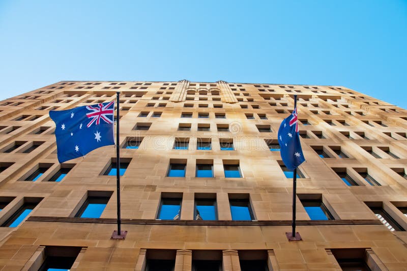 Two Australia Flags Hanging from a Sandstone Building Stock Photo ...