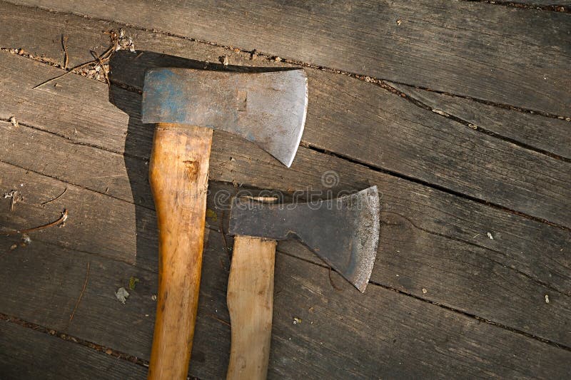 Two Axes on the ground stock image. Image of outdoor - 94643201