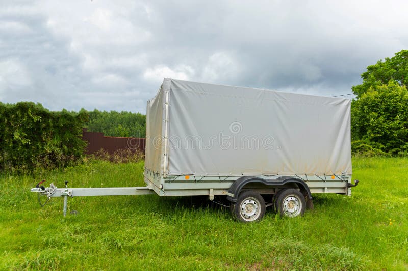 A Two-axle Semi-trailer is Parked on a Lawn Stock Photo - Image of ...