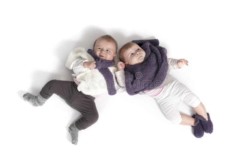Two babies lying together stock image. Image of relationship - 27036761