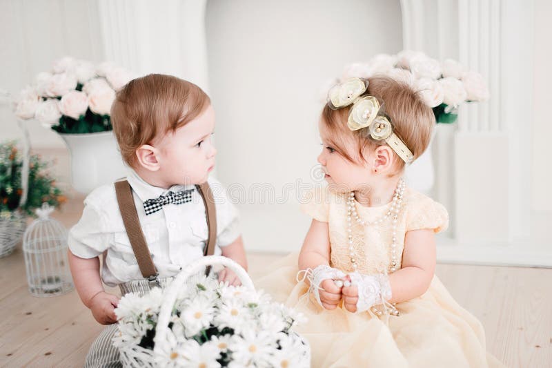 Two Babies Wedding - Boy and Girl Dressed As Bride and Groom Stock ...