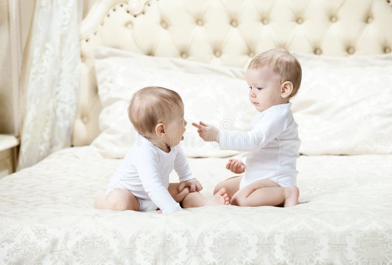 Two babies talking stock photo. Image of childhood, care - 7433336