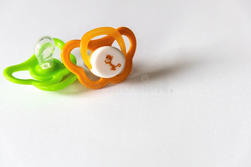 Two Baby Pacifiers on a White Background. Stock Image - Image of goods ...