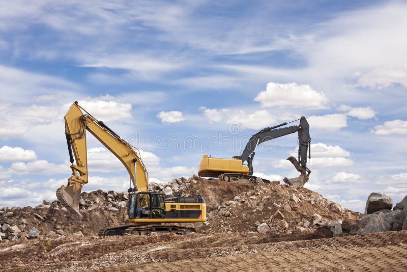 Two Backhoes stock image. Image of excavator, machinery - 29210129
